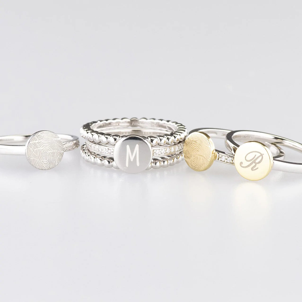 Gedenkringen met vingerafdruk/gravure – gedenk-sieraad.be